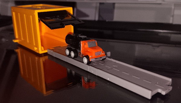 Driven Pocket Series Mini Truck.Petrol, with garage and 3 hi-way pieces
